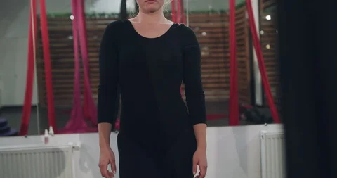 Portrait of beautiful female gymnast loo... | Stock Video | Pond5