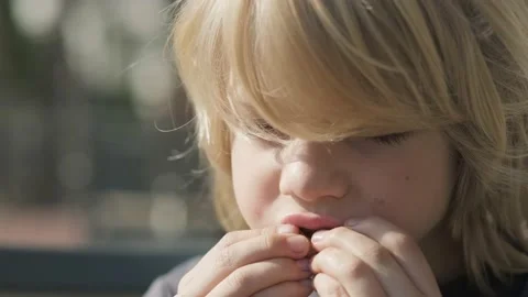 portrait blonde boy eating chicken nugge... | Stock Video | Pond5