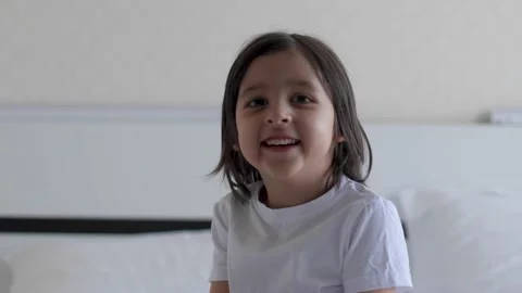 portrait of a boy a child looks at a por... | Stock Video | Pond5