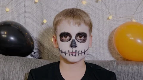 Portrait of a boy with makeup on his fac... | Stock Video | Pond5