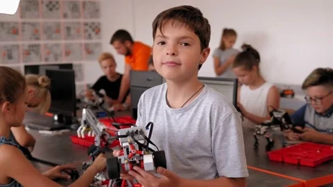Portrait of a boy student in robotics of... | Stock Video | Pond5