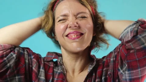 Portrait of a cheerful pin-up woman in a... | Stock Video | Pond5