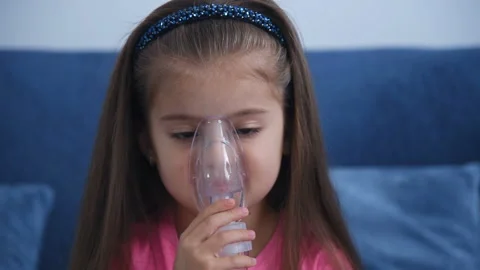 Portrait of a child in an inhalation mas... | Stock Video | Pond5