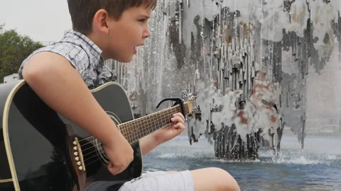 Boy Vocal Cute Stock Videos – Royalty-Free HD & 4K Videos