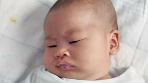 Portrait of cute little Asian newborn ba... | Stock Video | Pond5