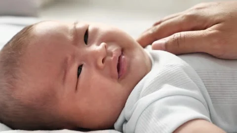 Portrait of cute little Asian newborn ba... | Stock Video | Pond5