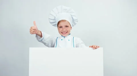 Portrait cute little chef cook in cap wi... | Stock Video | Pond5