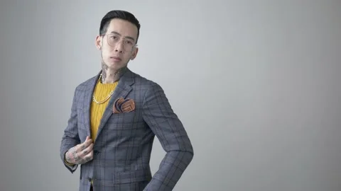 Portrait of dapper young man with tattoo... | Stock Video | Pond5