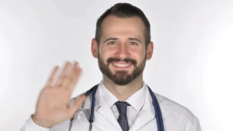 Portrait of Doctor Waving Hand to Welcom... | Stock Video | Pond5