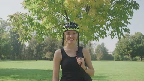 Portrait of a Female Cyclist with a Helm... | Stock Video | Pond5