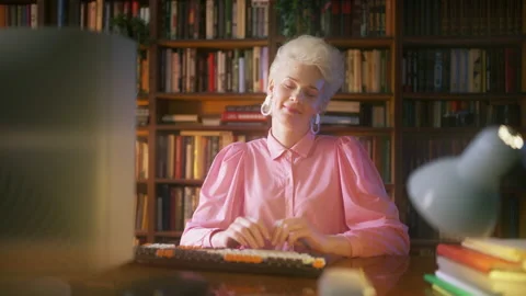 Portrait of female secretary sitting beh... | Stock Video | Pond5