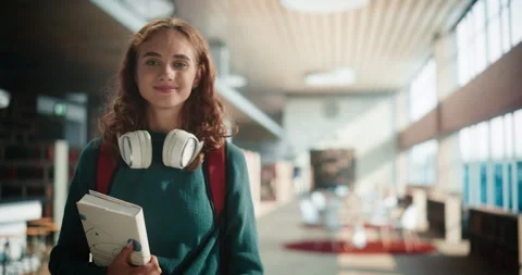 Portrait Female Student in Library | Stock Video | Pond5