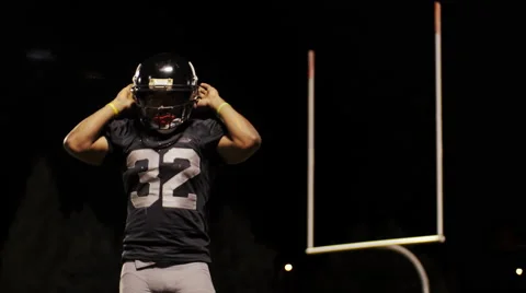 Portrait of a football player taking off... | Stock Video | Pond5