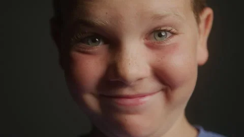 Portrait of Goofy Boy with Black Backdro... | Stock Video | Pond5