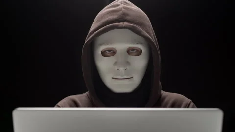 Portrait of hacker in anonymous mask usi... | Stock Video | Pond5