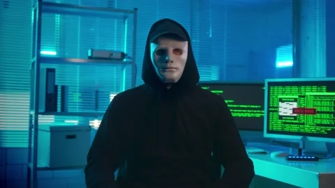 Portrait of a hacker in a white mask loo... | Stock Video | Pond5