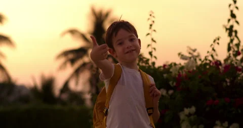 Portrait handsome child of a happy cute ... | Stock Video | Pond5