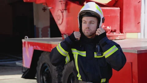 Portrait of the handsome fireman in the ... | Stock Video | Pond5