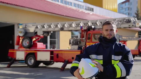 Portrait of the handsome fireman in the ... | Stock Video | Pond5