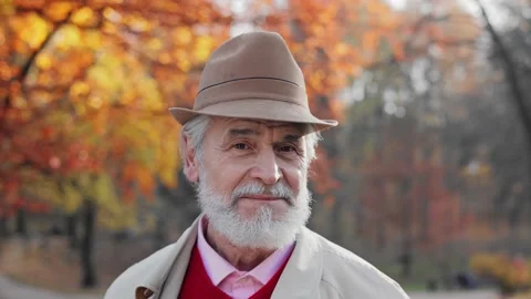 Portrait of handsome old grandfather loo... | Stock Video | Pond5