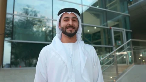 Portrait of happy Arab man with modern b... | Stock Video | Pond5