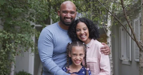 Portrait of happy biracial parents with ... | Stock Video | Pond5