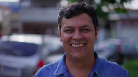 Portrait of a happy diverse Brazilian ma... | Stock Video | Pond5