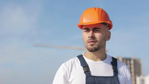 Portrait of a happy engineer looking at ... | Stock Video | Pond5