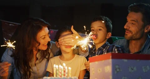 Portrait of happy family celebrating bir... | Stock Video | Pond5