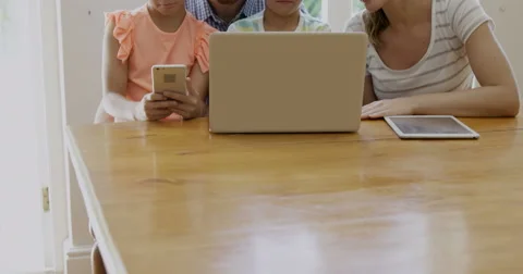 Portrait of happy family using technolog... | Stock Video | Pond5