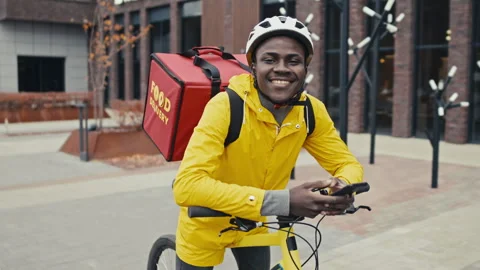 Portrait of Happy Food Delivery Guy on B... | Stock Video | Pond5