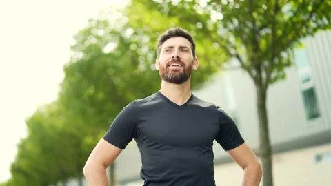 Portrait happy man standing in nature re... | Stock Video | Pond5