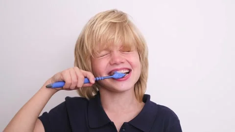 Portrait happy smiling child kid boy bru... | Stock Video | Pond5