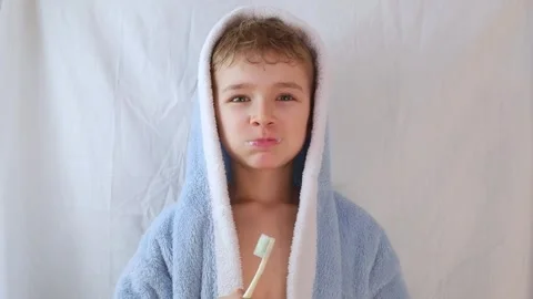 Portrait happy smiling child kid boy bru... | Stock Video | Pond5