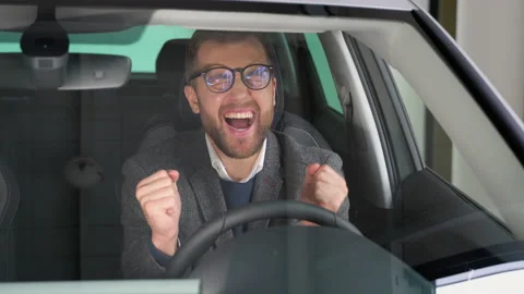 Portrait of a happy stylish man driving ... | Stock Video | Pond5