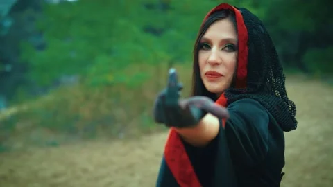 Portrait happy woman witch waving hand g... | Stock Video | Pond5