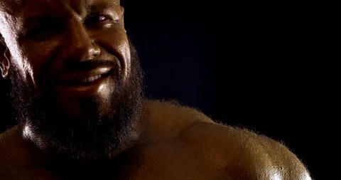 portrait of a huge bald man with bronze ... | Stock Video | Pond5