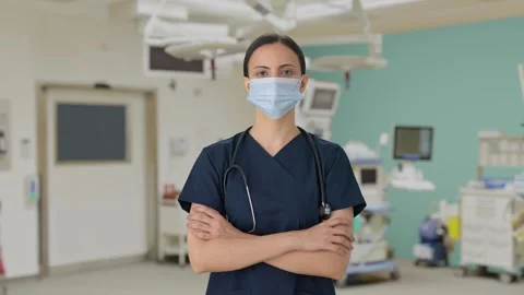 Portrait of Indian female doctor in surg... | Stock Video | Pond5