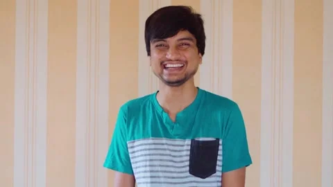 Portrait of an Indian man laughing while... | Stock Video | Pond5
