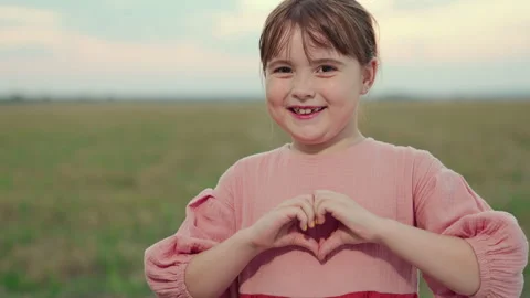 Portrait, kind smile of child. Cute litt... | Stock Video | Pond5