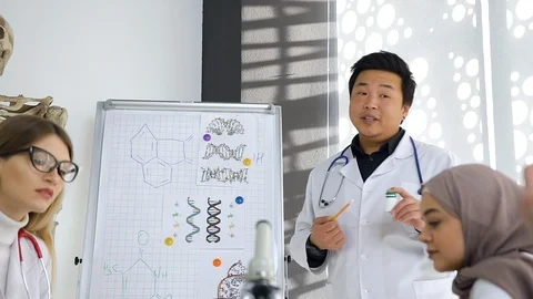 Portrait of korean male doctor lecturing... | Stock Video | Pond5