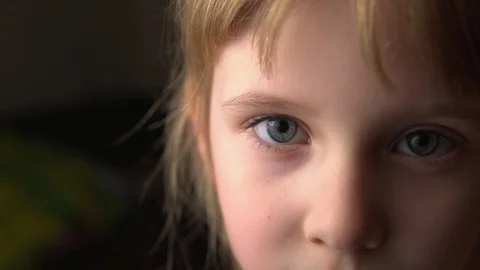 Portrait of a little girl. Face close up | Stock Video | Pond5