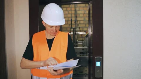 Portrait of a male utility worker, eleva... | Stock Video | Pond5