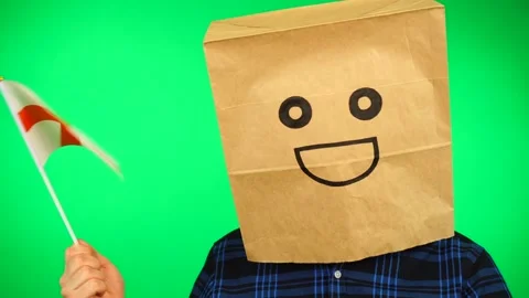 Portrait of man with paper bag on head w... | Stock Video | Pond5