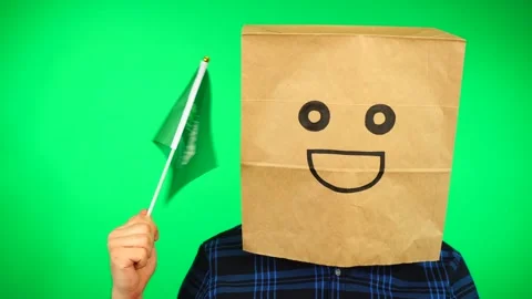 Portrait of man with paper bag on head w... | Stock Video | Pond5