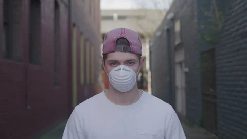 Portrait of a Masked Man Standing in an ... | Stock Video | Pond5