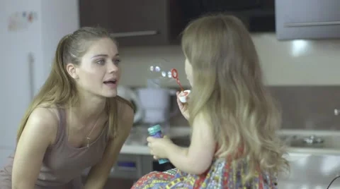 Portrait of mother and daughter -profile... | Stock Video | Pond5