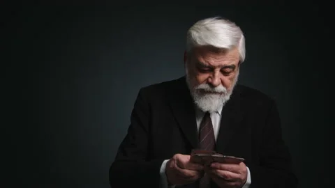 Portrait of old professor counting his m... | Stock Video | Pond5