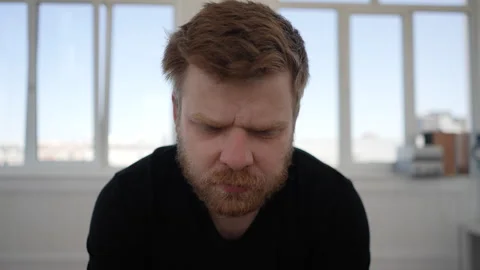 Portrait of sad crying young man sharing... | Stock Video | Pond5