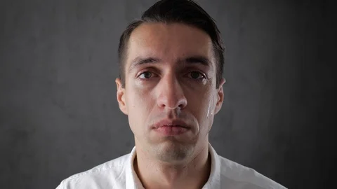 Portrait of sad man looking at camera wi... | Stock Video | Pond5